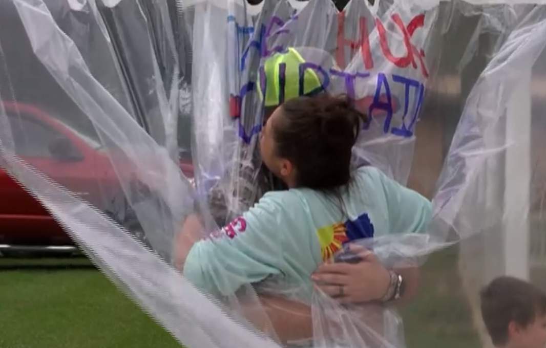 Grandmother constructs ‘hug curtain’ that keeps family close while ...